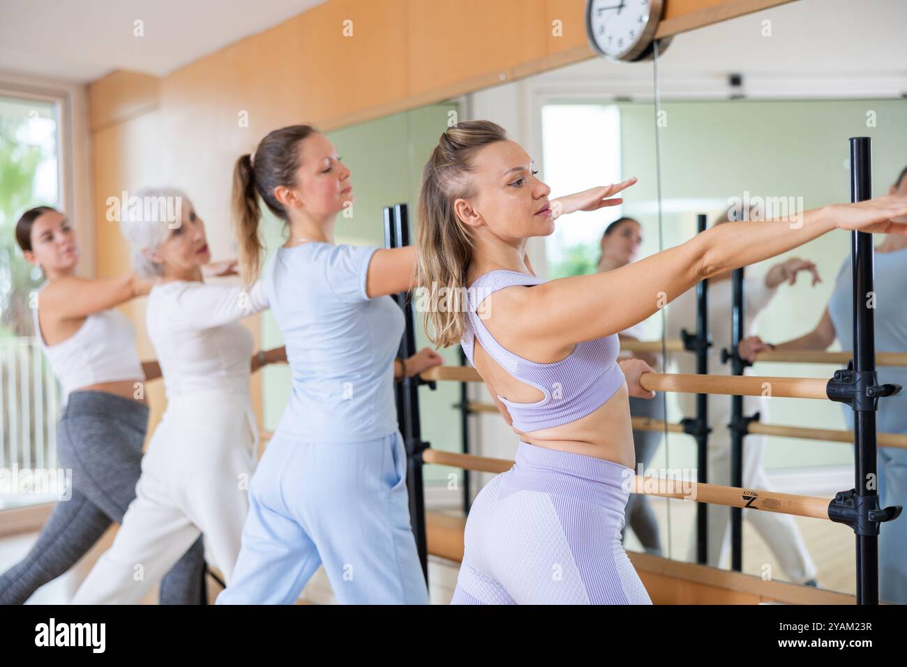 Adults learning to dance ballet in dancing school Stock Photo - Alamy