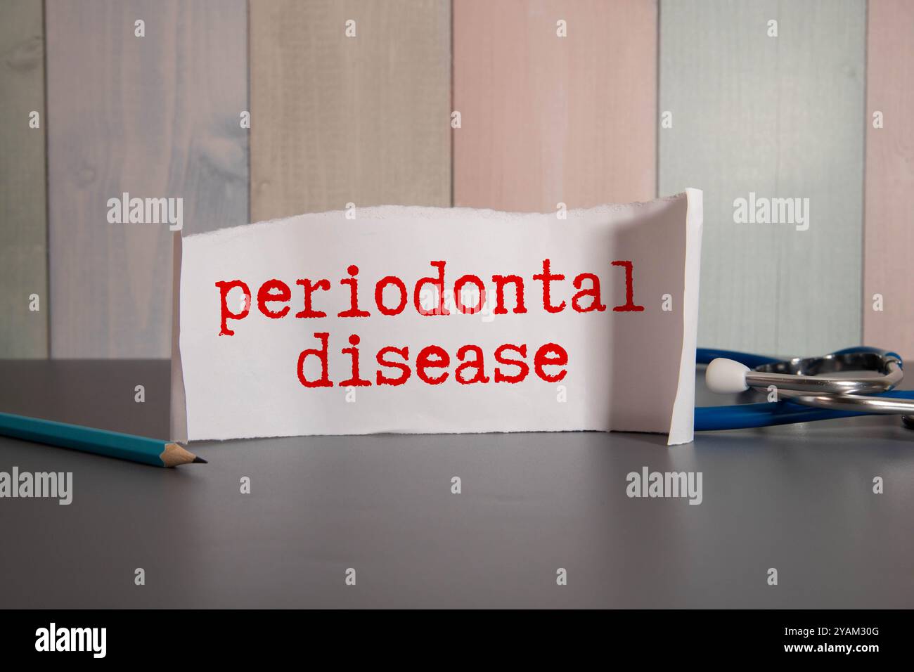 Closeup of pencil eraser and black periodontal disease text ...