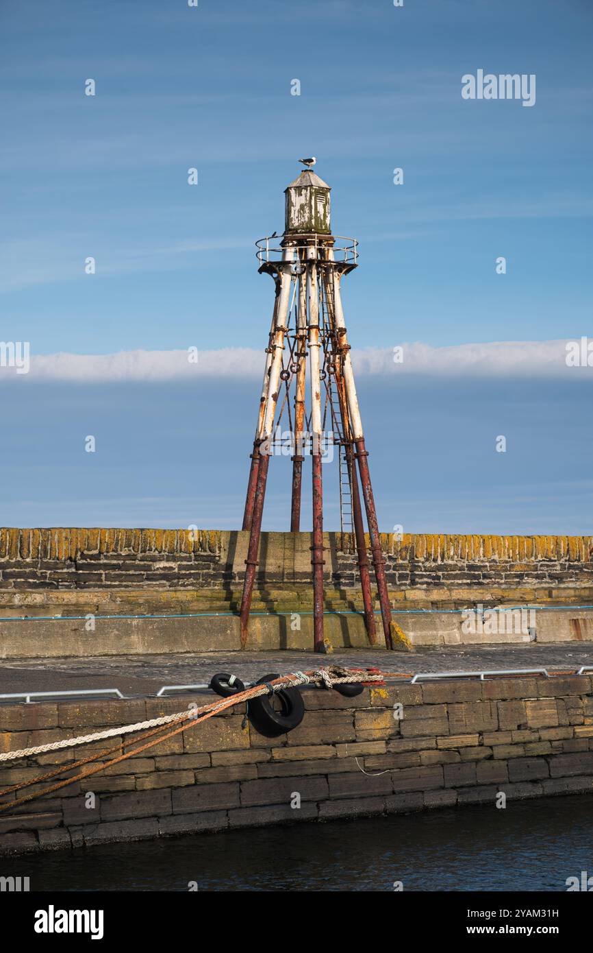An old iron navigation beacon was built on the Wick harbour wall ...