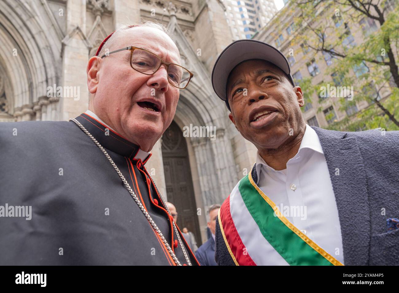 New York, USA. 14th Oct, 2024. Cardinal Timothy Dolan and Mayor Eric ...