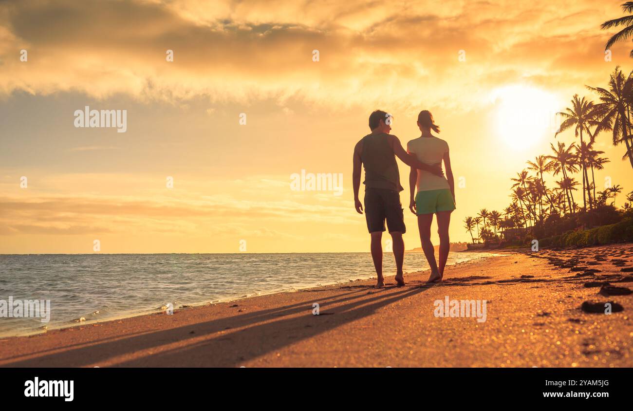 Woman walking tropical beach sunset hi-res stock photography and images ...