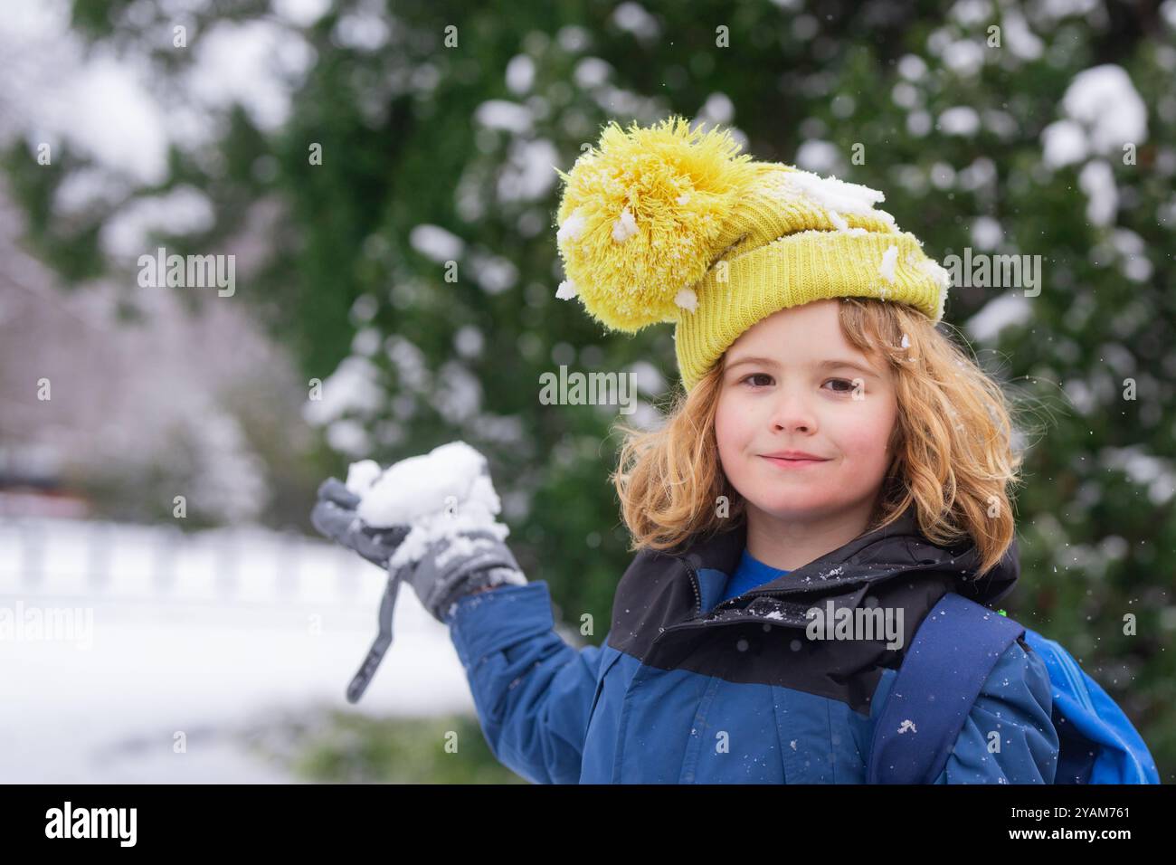 Kids play with snow in winter park. First Winter snow. Kids winters ...