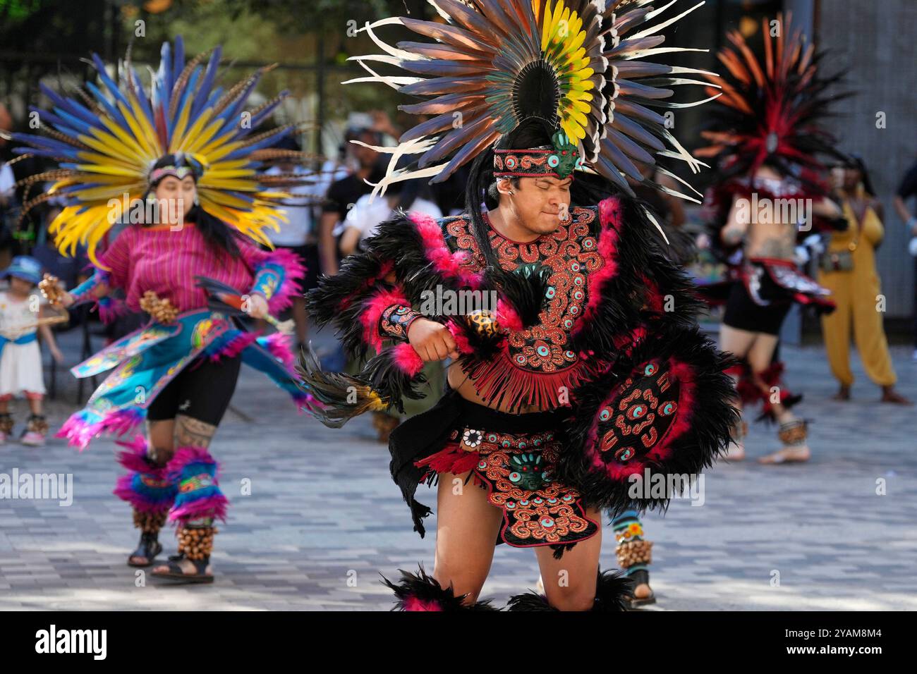 Grupo Coatlicue performs a traditional Aztec dance, an agricultural ...