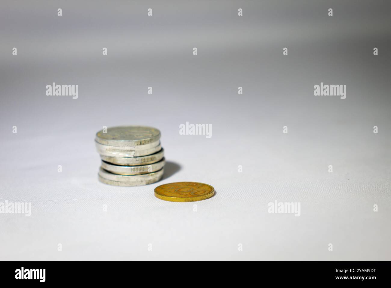 coin photographed close up from side angle with isolated white ...