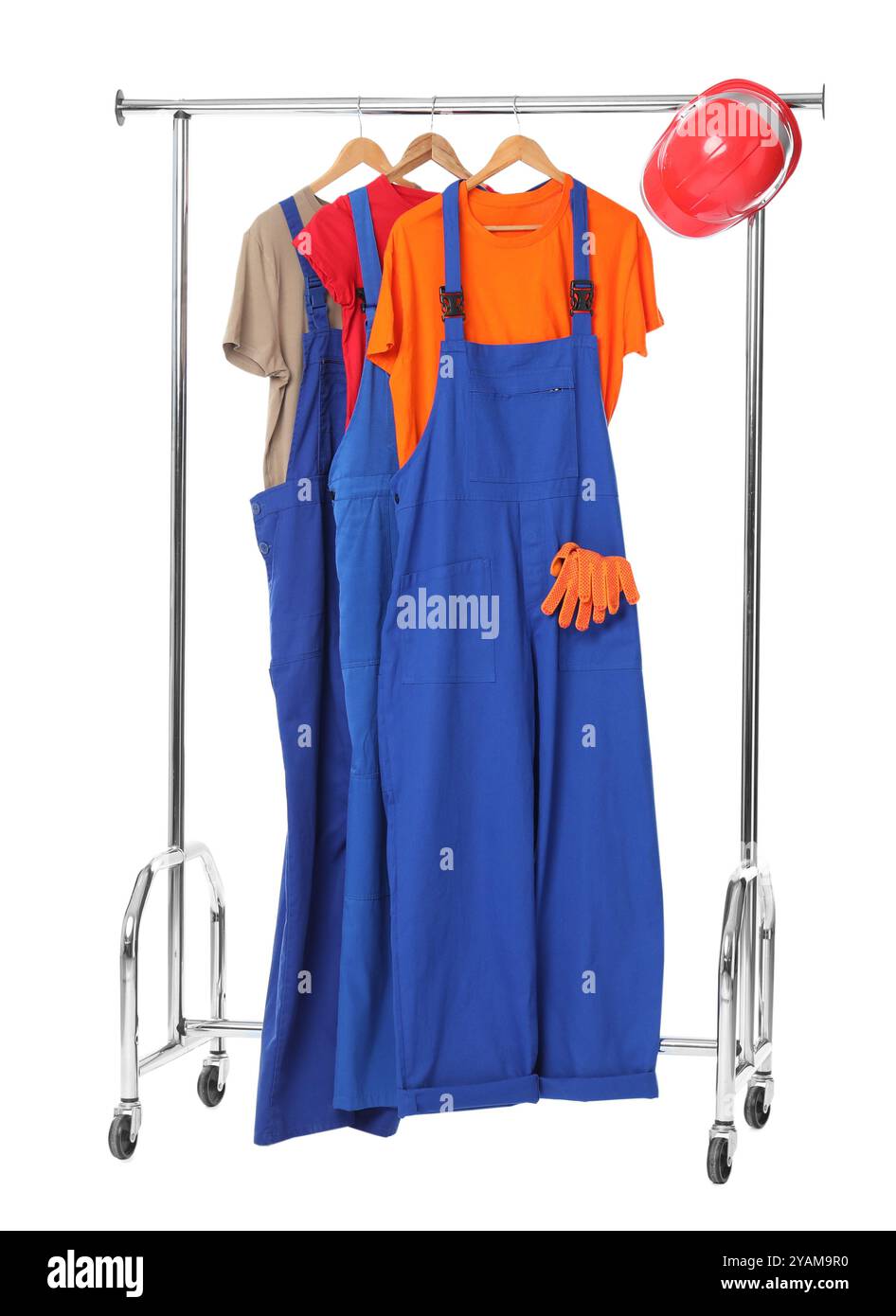 Workers' uniforms on clothing rack isolated on white Stock Photo - Alamy