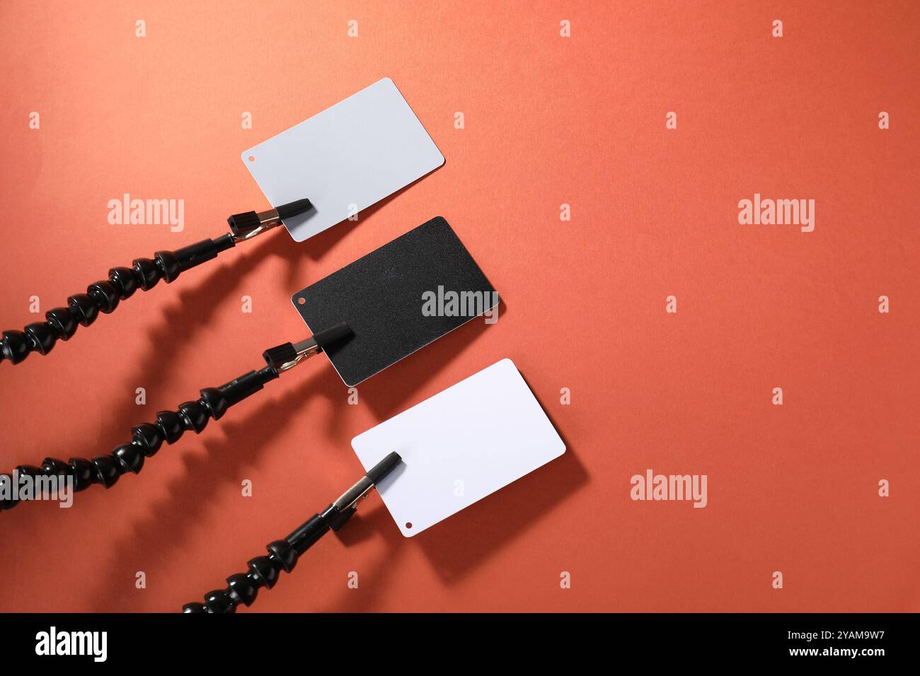 White balance calibration cards on red background. Space for text Stock ...