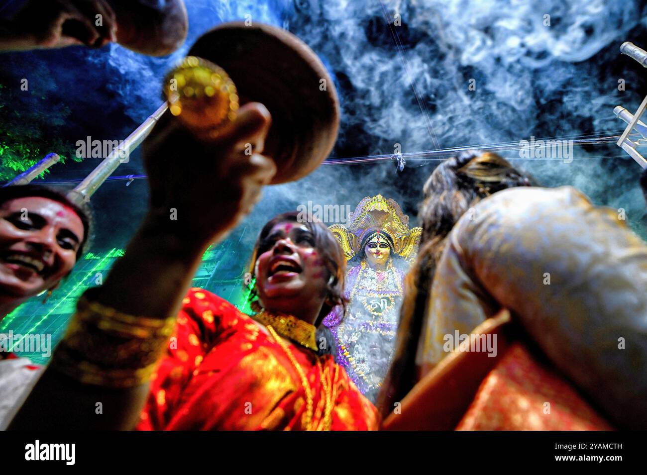 Bengali women performing dhunuchi dance on the occasion of durga puja ...