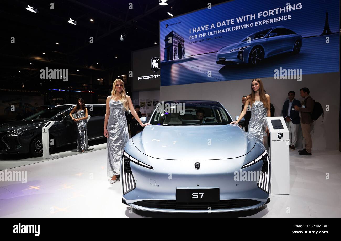 Paris, France. 14th Oct, 2024. People visit the pavilion of Chinese carmaker Dongfeng Forthing ...