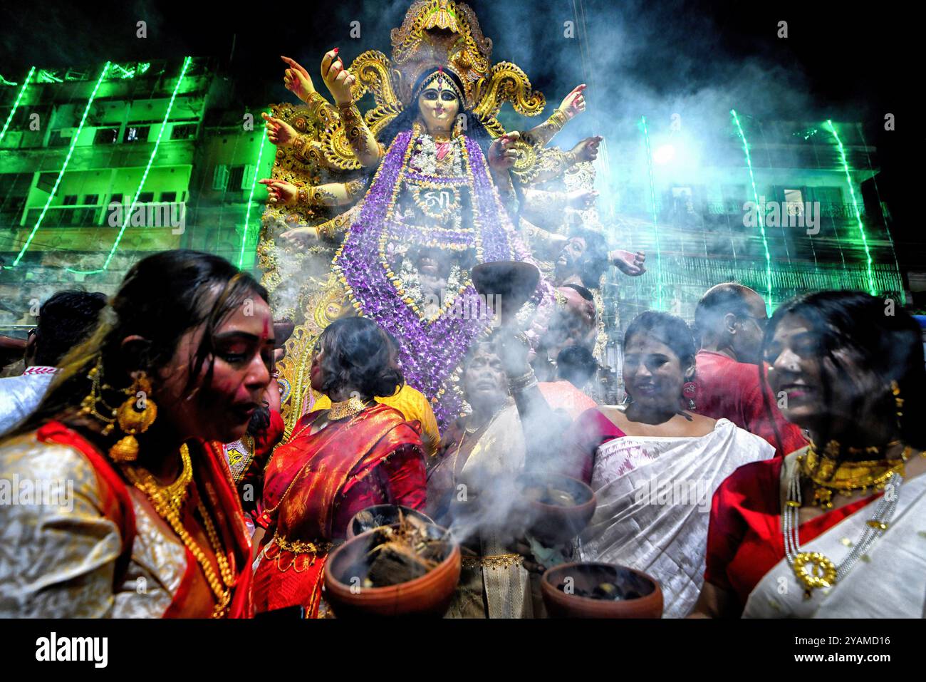 Hindu women devotees perform dhunuchi dance on the occasion of Durga ...