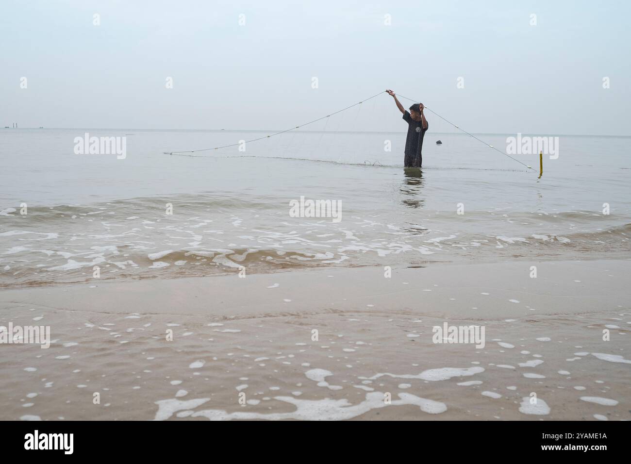 Checking fishing nets hi-res stock photography and images - Alamy