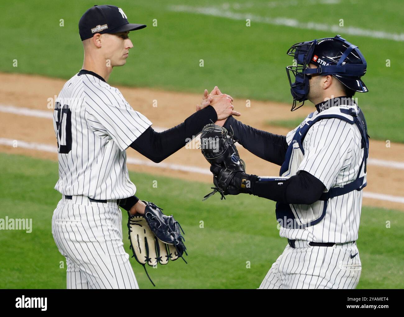 New York Yankees closing pitcher Luke Weaver is congratulated by ...