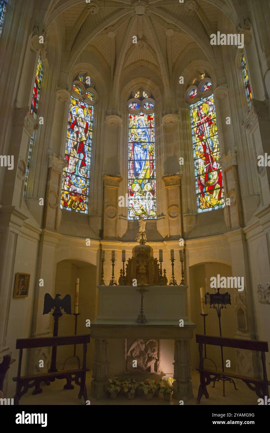 Spiritual room with stained glass windows and a brightly lit altar ...