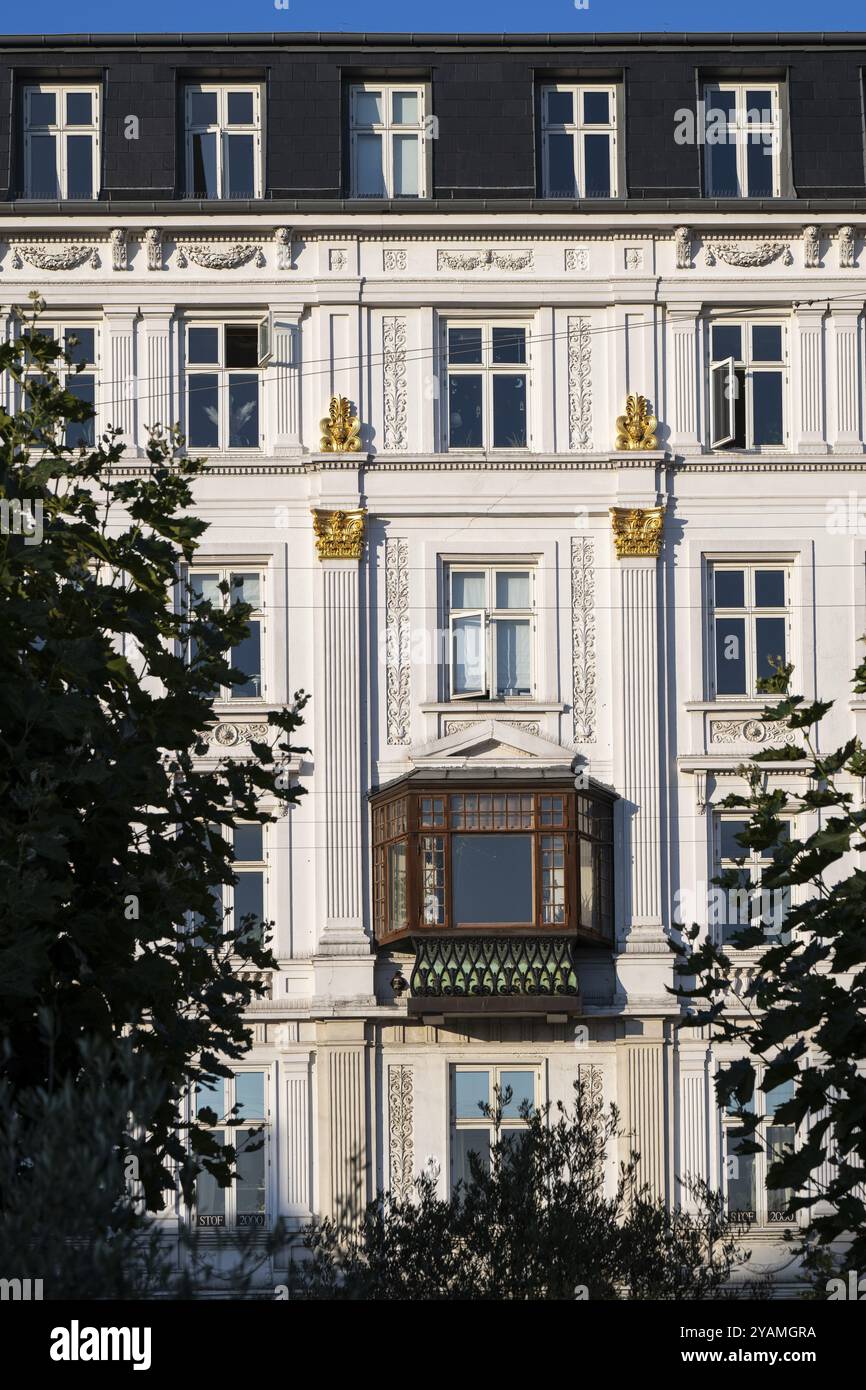 Neoclassical house facade with stucco decorations and a projecting bay ...