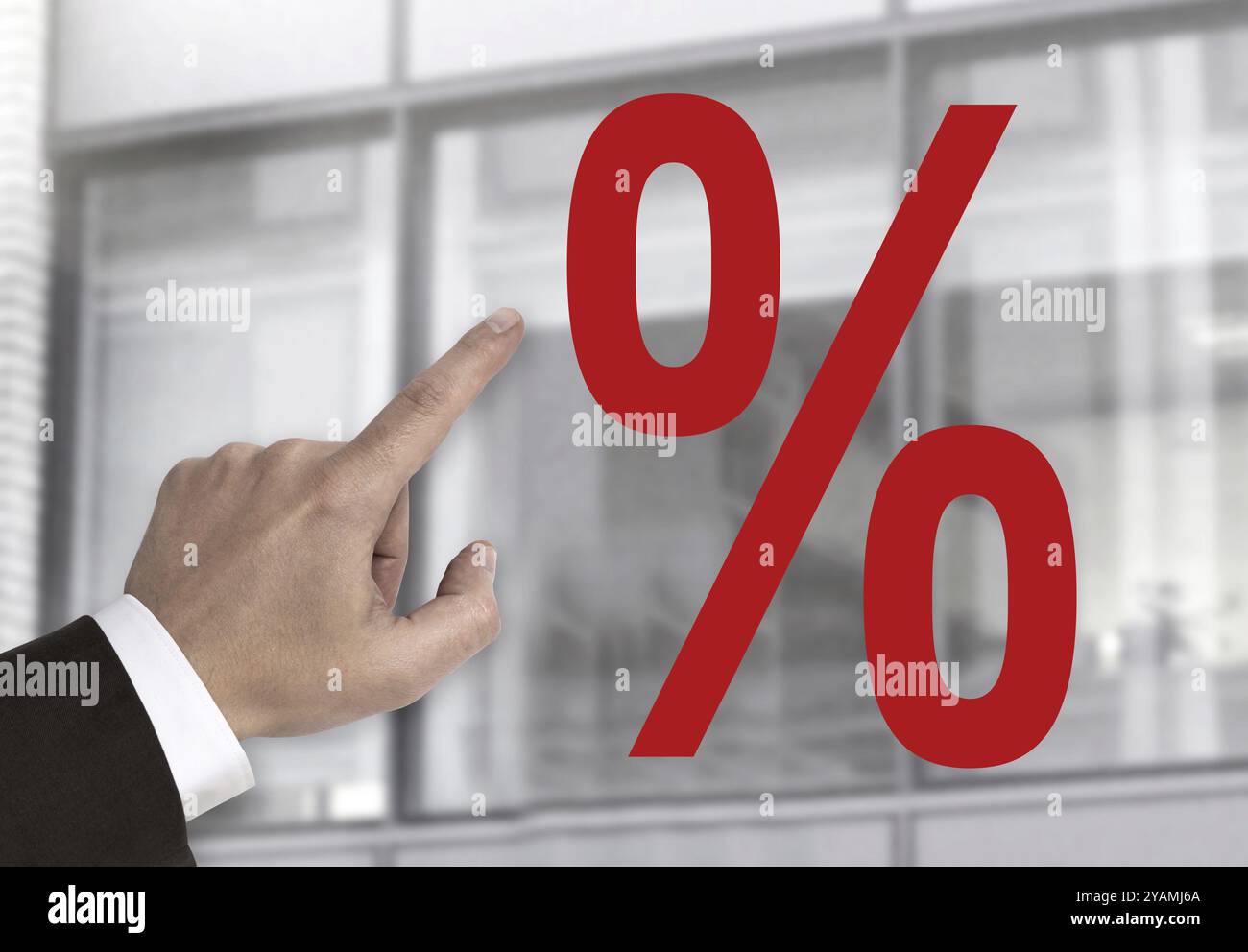 Hand points to percentage sign Concept Stock Photo - Alamy