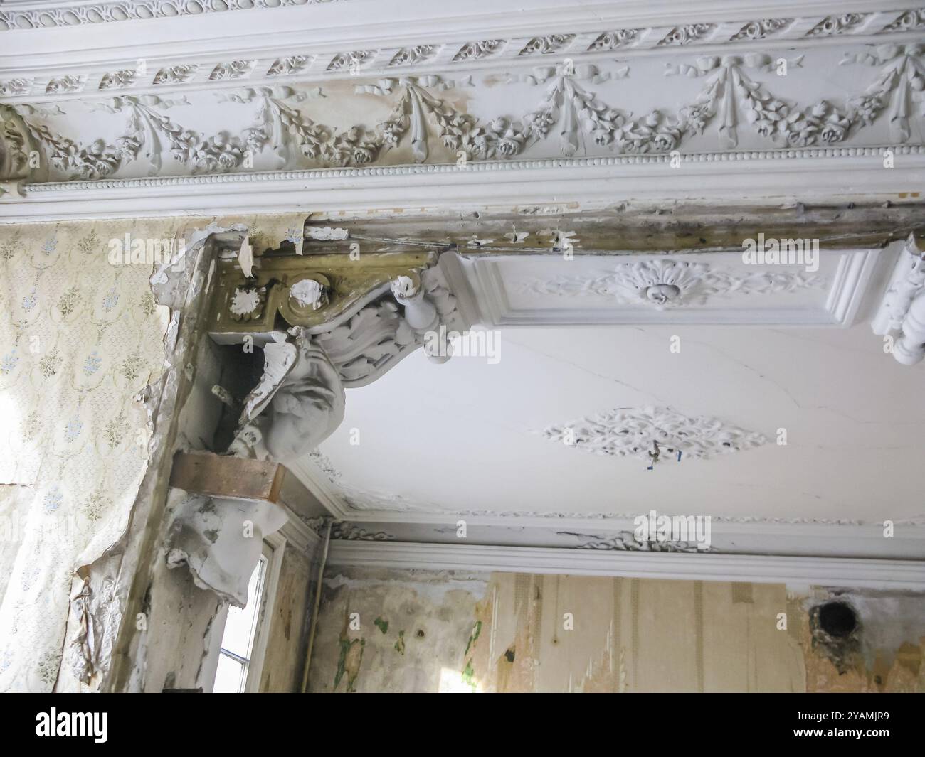 View on destroyed interior interior in old building Stock Photo - Alamy