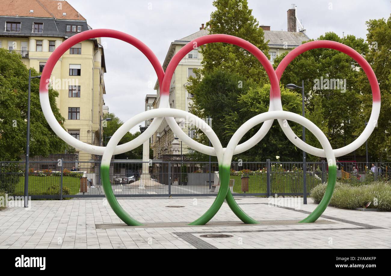 This work of art is essentially Olympic rings painted in the red, white ...