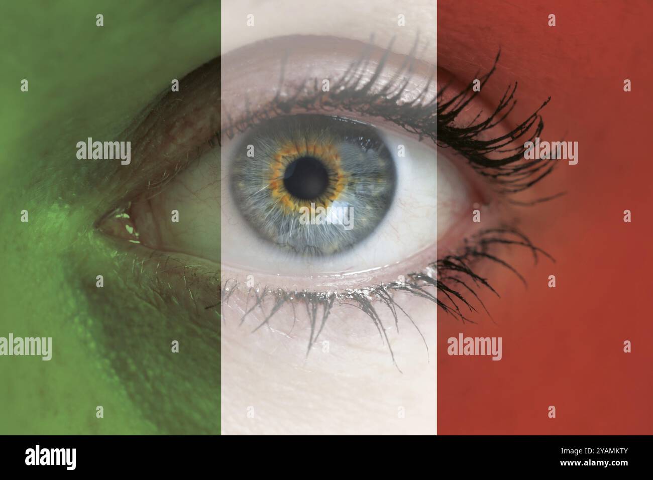 Eye looks through italy flag concept background macro Stock Photo - Alamy