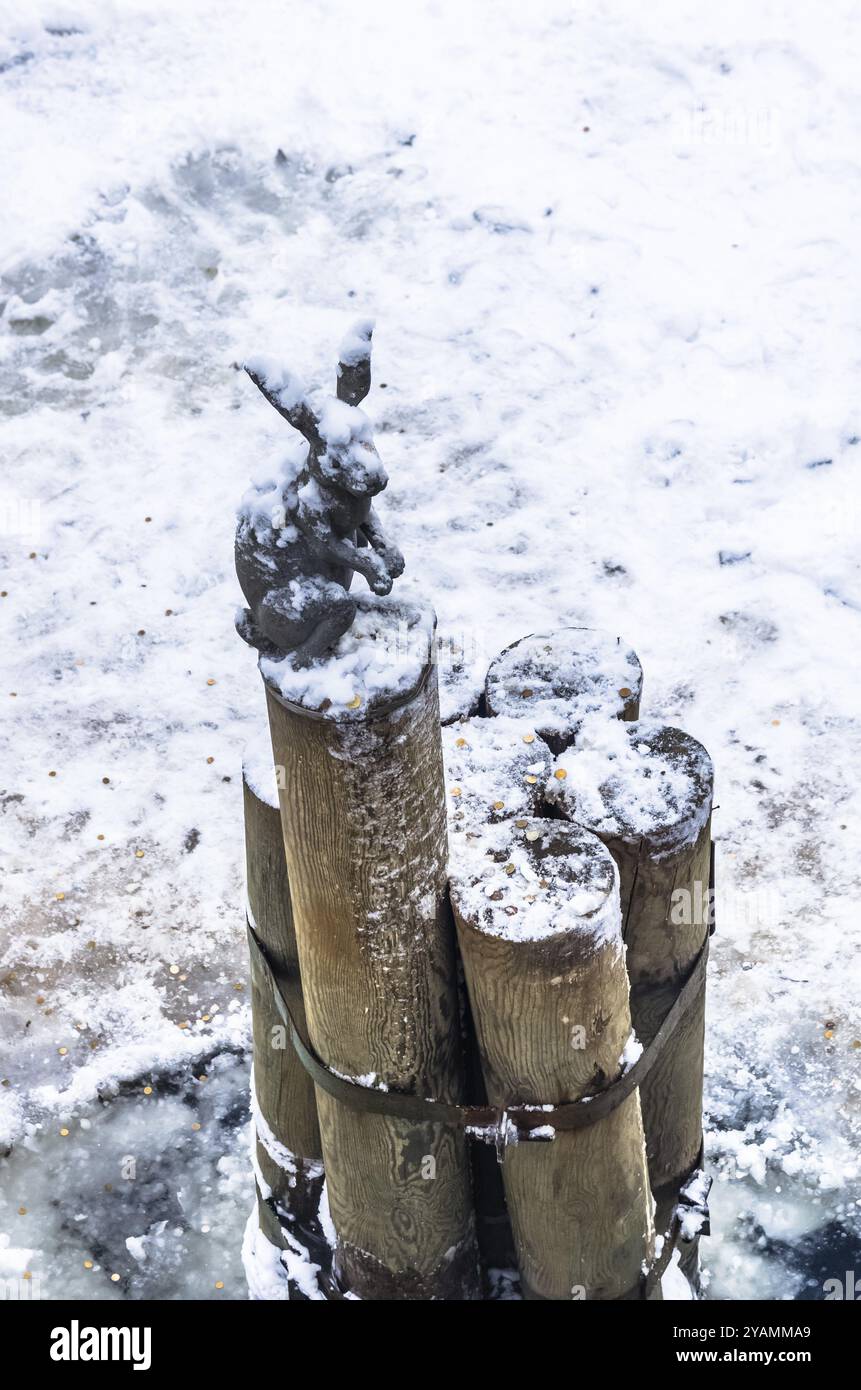 Bronze hare statue at Peter and Paul Fortress at winter in Saint ...