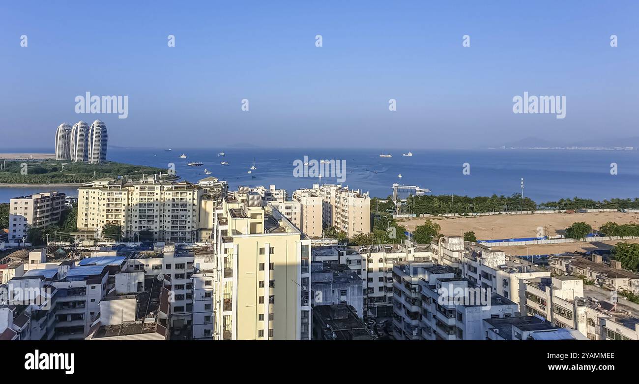 Scenic top panorama seascape and cityscape view of Sanya city on Hainan ...