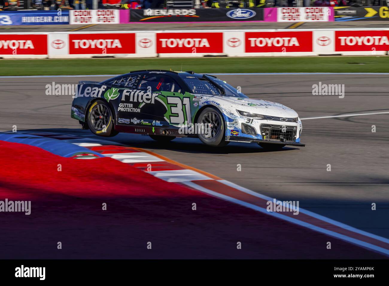 NASCAR Cup Series driver, JUSTIN HALEY (31), races through the turns ...