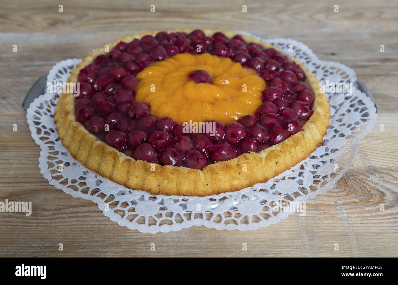 Fruit base with cherries and mandarins on rustic wood Stock Photo - Alamy