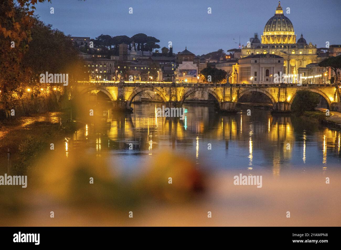 View over the river Tiber in a historic city. The old famous bridge ...