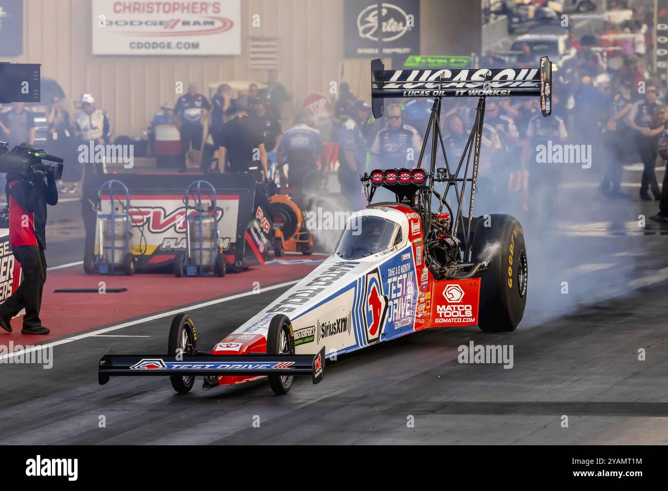 NHRA driver, Antron Brown, prepares to qualify for the Dodge Power ...