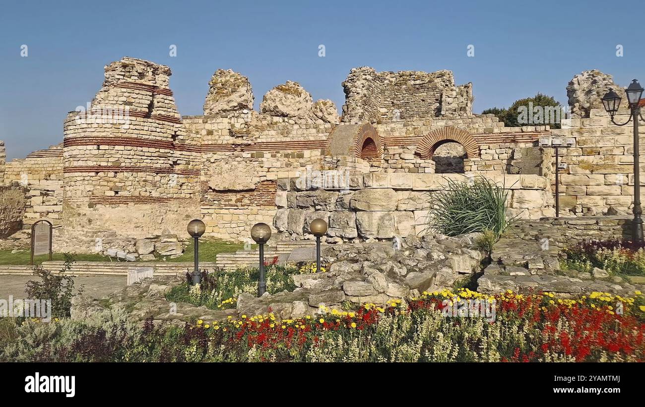 Ancient ruins of Nessebar, weathered brick and stone walls remnants of ...