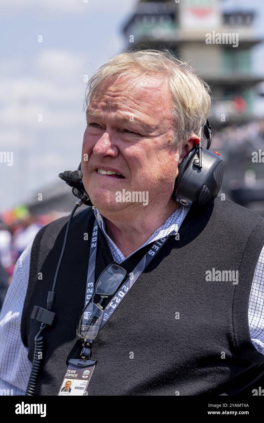 Team Owner, DALE COYNE, watches his team work on their race car before ...