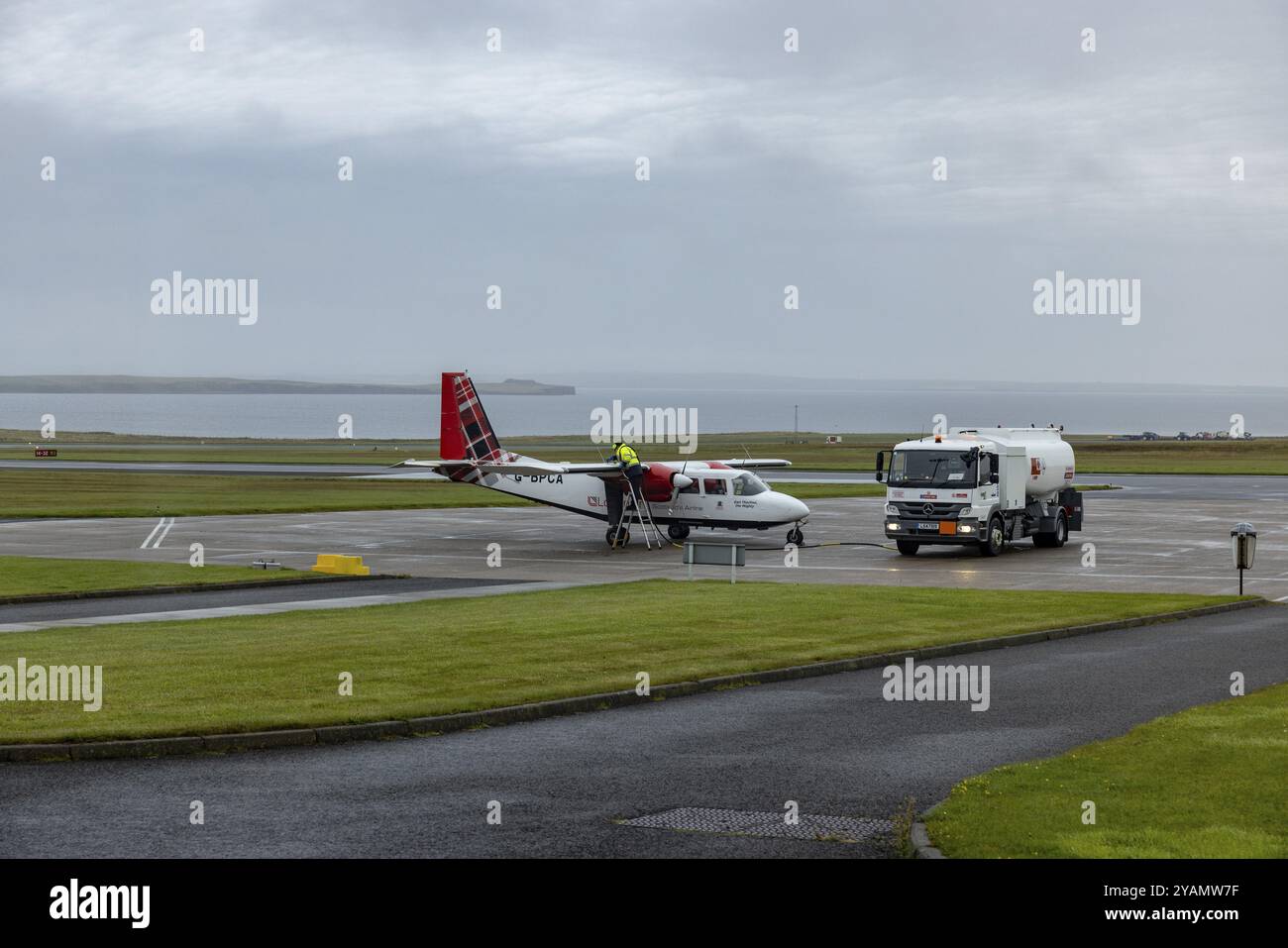 Refuelling with tanker truck, small aircraft, Britten-Norman Islander ...