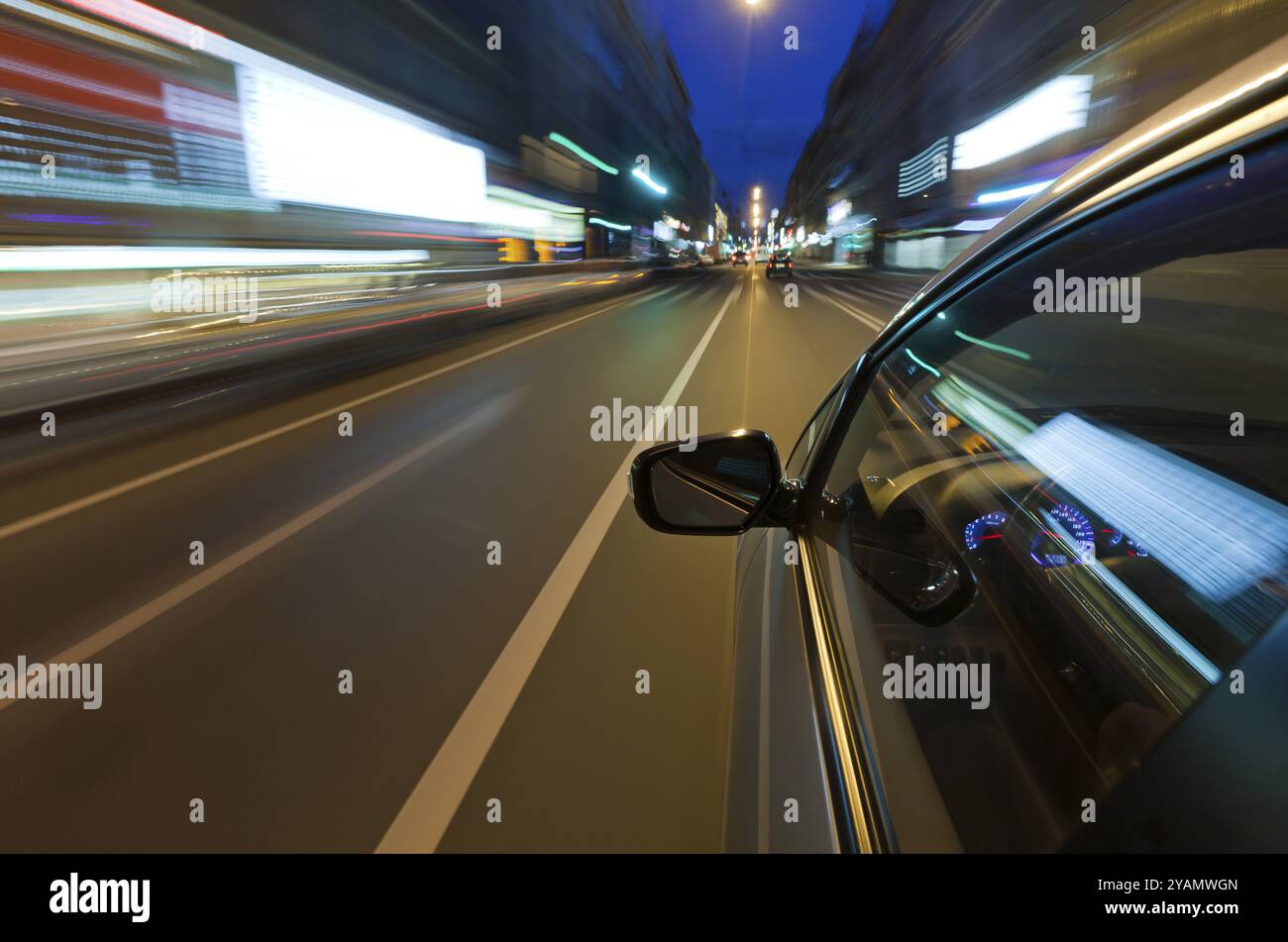 Cars driving through the city hi-res stock photography and images - Alamy