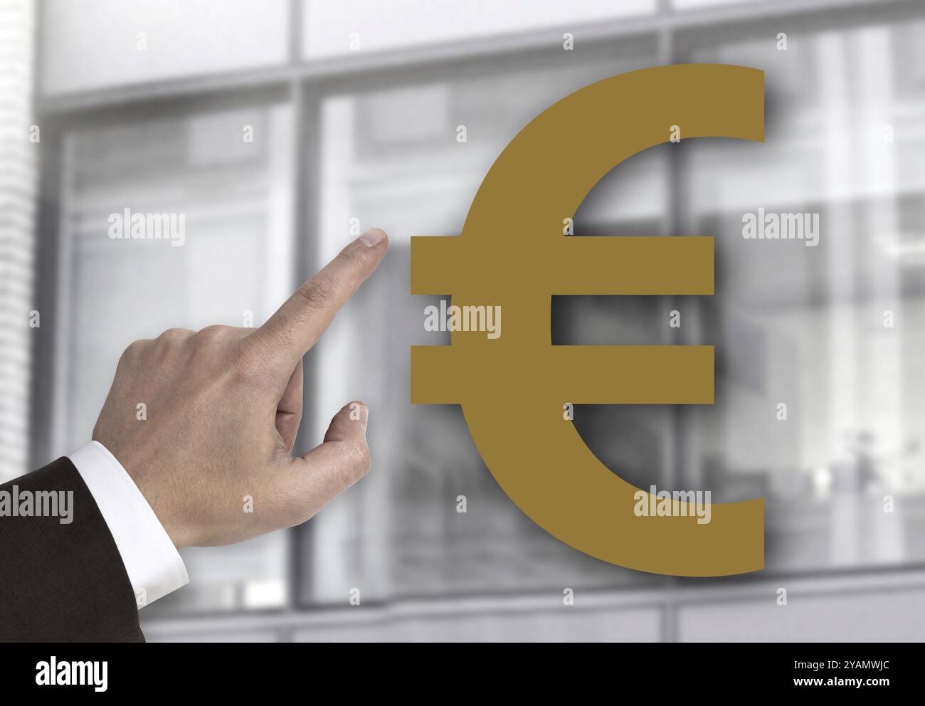 Hand points to euro sign Concept Stock Photo - Alamy