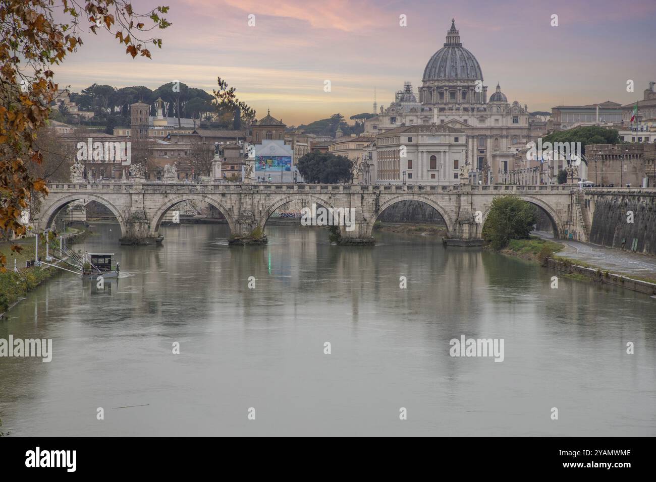 View over the river Tiber in a historic city. The old famous bridge ...
