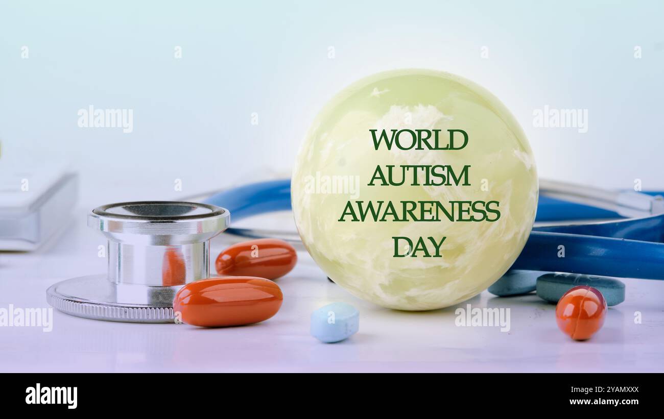 WORLD AUTISM AWARENESS DAY written on the ball, front view Stock Photo ...