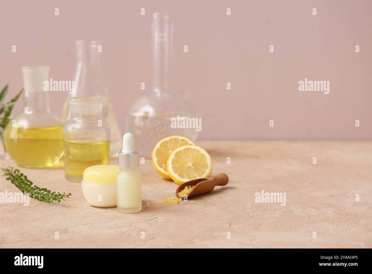 Laboratory glassware with ingredients and samples for preparing natural ...