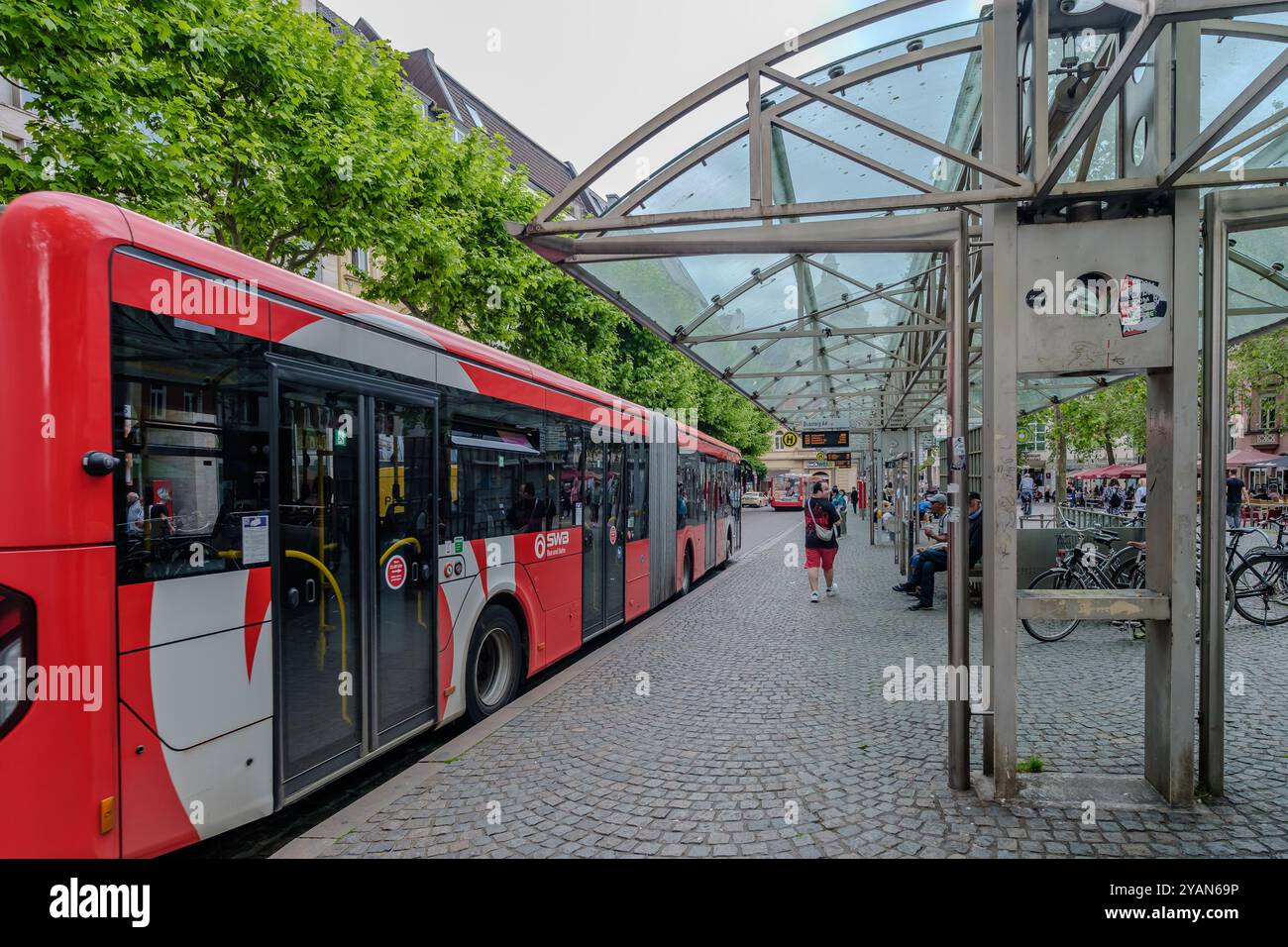 Bonn, Germany : May 21, 2024 : View of public buses arriving and ...