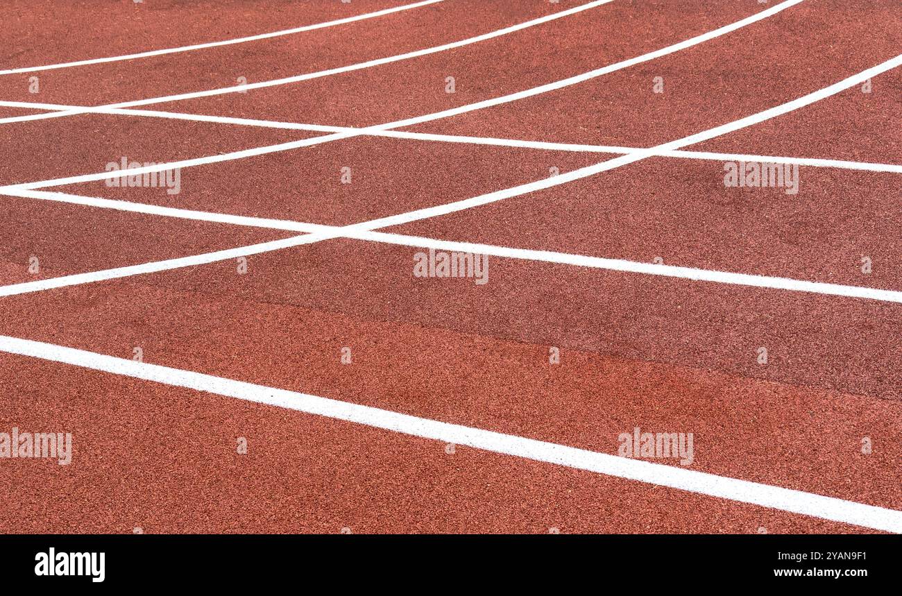 Red treadmill with the lines at the stadium. Treadmill lane on sport ...