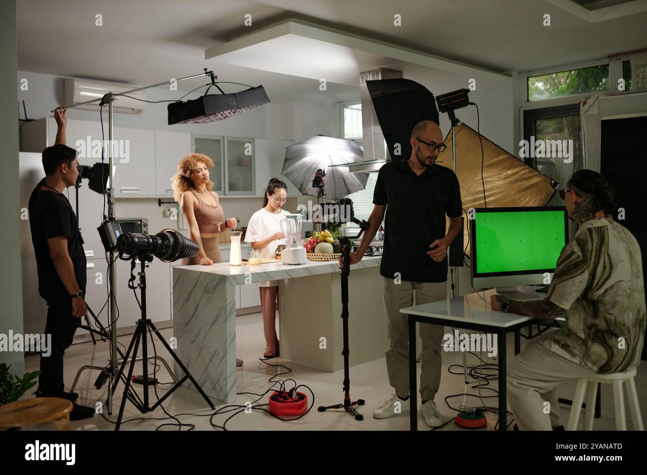 Team Of Operators And Photographers Working In Studio Stock Photo - Alamy