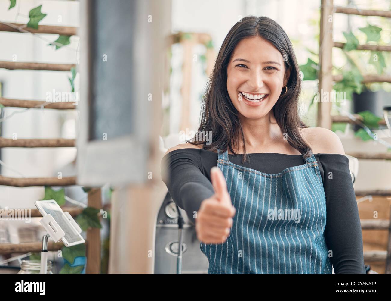Cafe, business owner and woman in portrait with thumbs up, achievement ...
