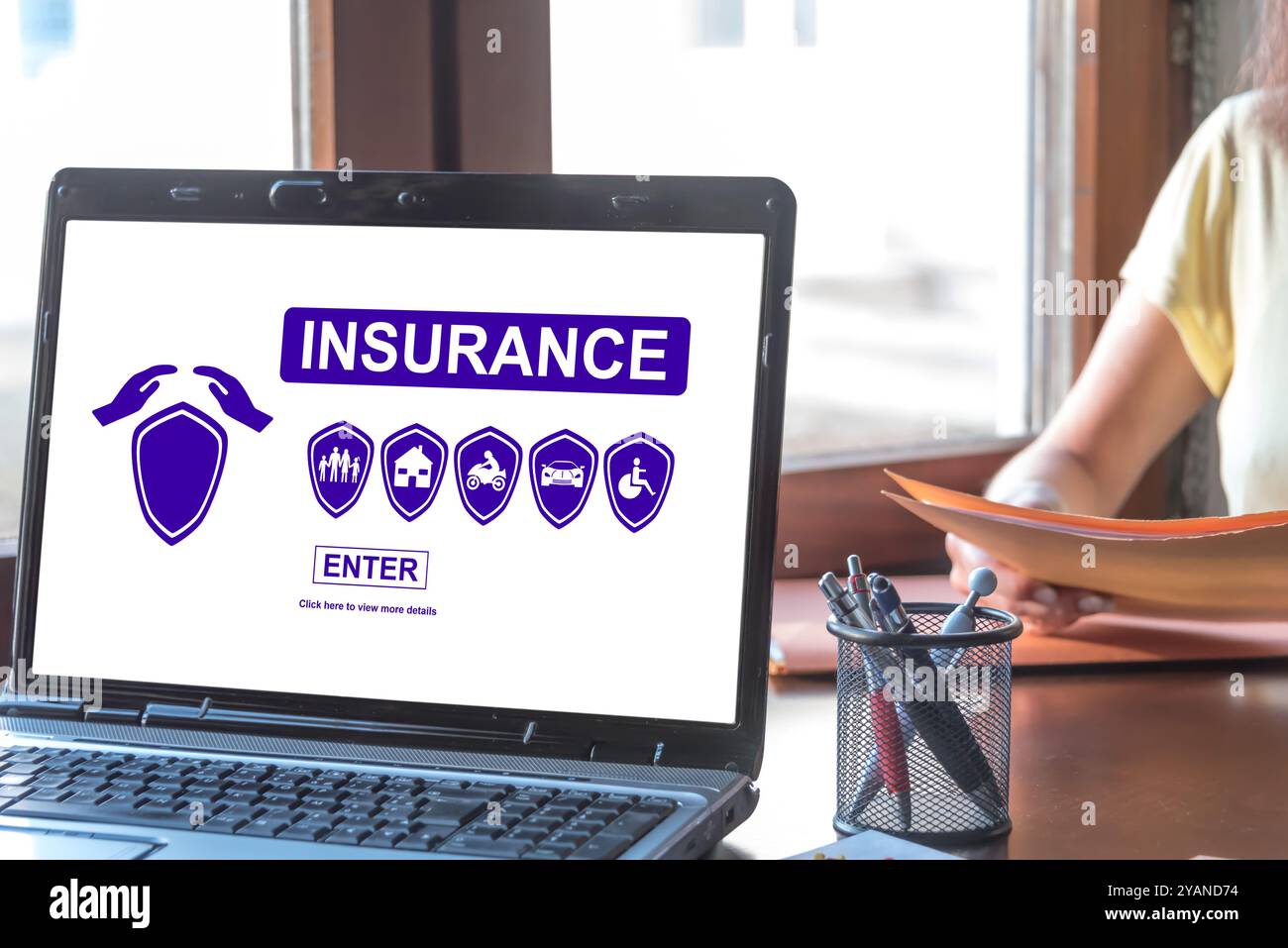 Laptop screen displaying an insurance concept Stock Photo - Alamy