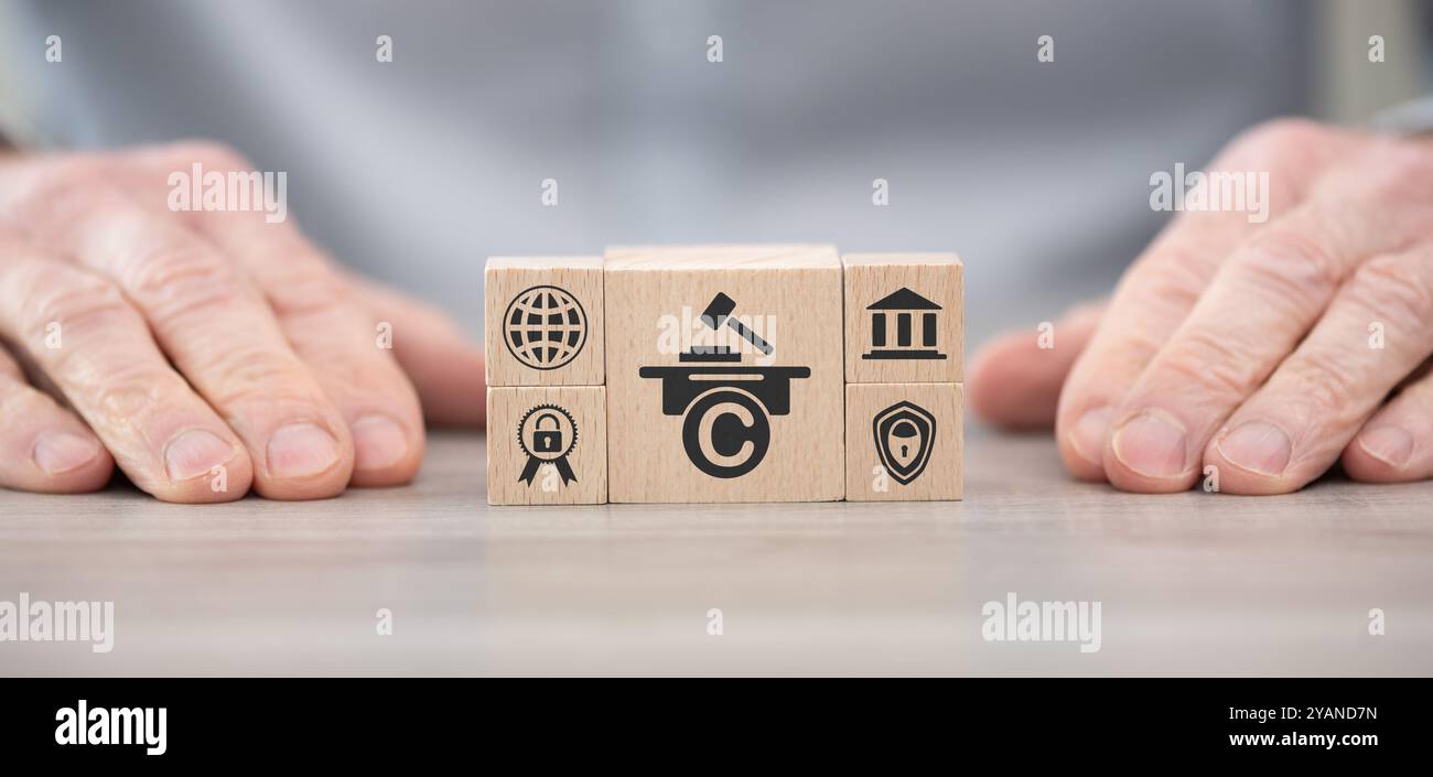 Wooden blocks with symbol of copyright concept Stock Photo - Alamy