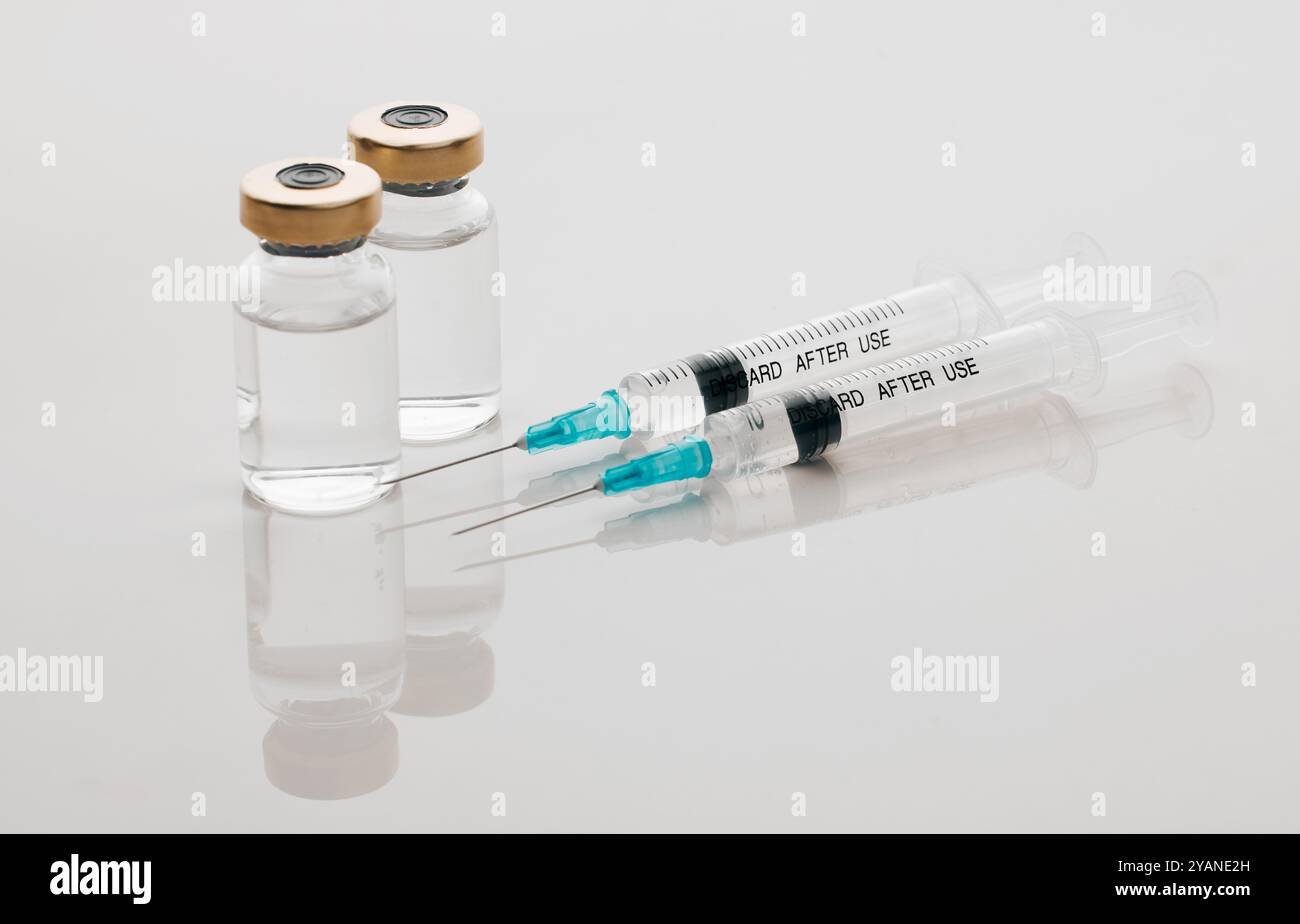 Healthcare, needle and drug vial for vaccine, medication and illness or ...