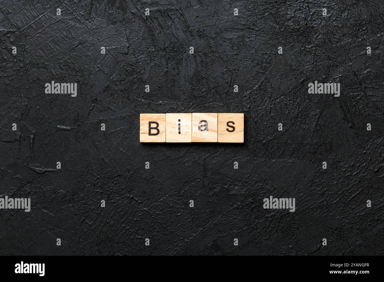 BIAS word written on wood block. BIAS text on cement table for your ... BIAS word written on wood block. BIAS text on cement table for your ...