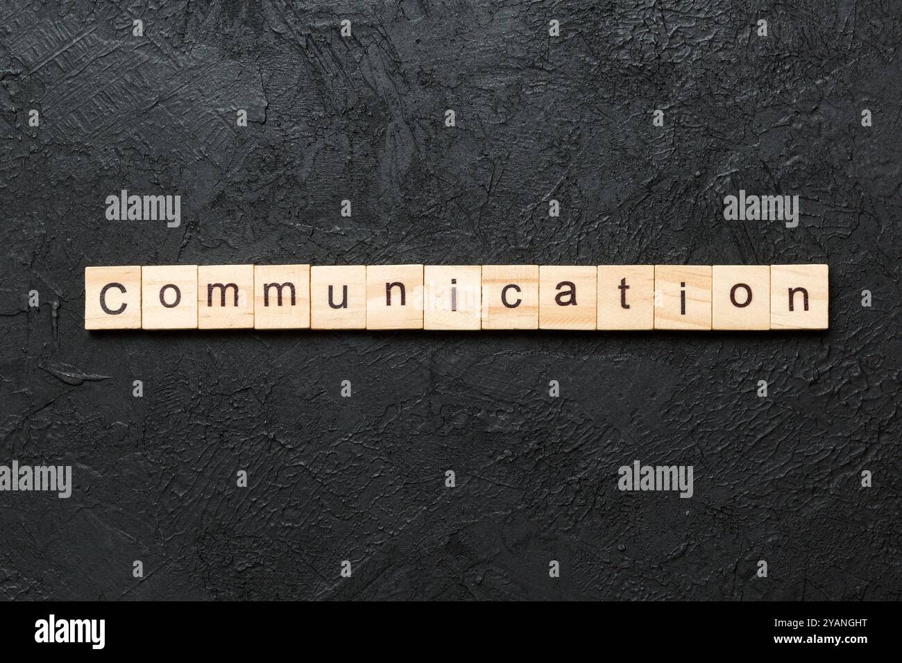 COMMUNICATION word written on wood block. COMMUNICATION text on cement ...