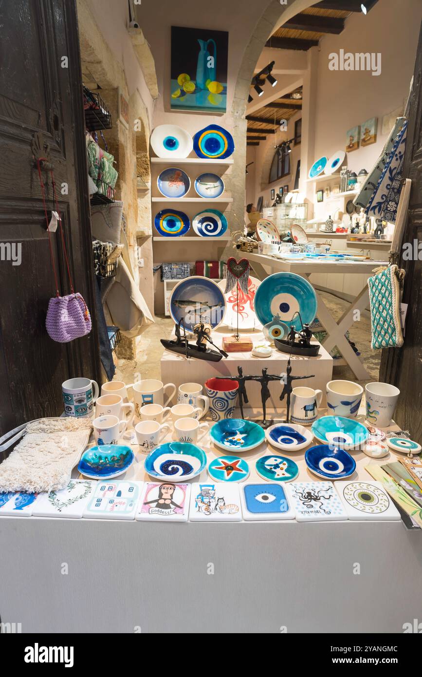 Gift shop Greece, view of a window display of colourful ceramics inside ...