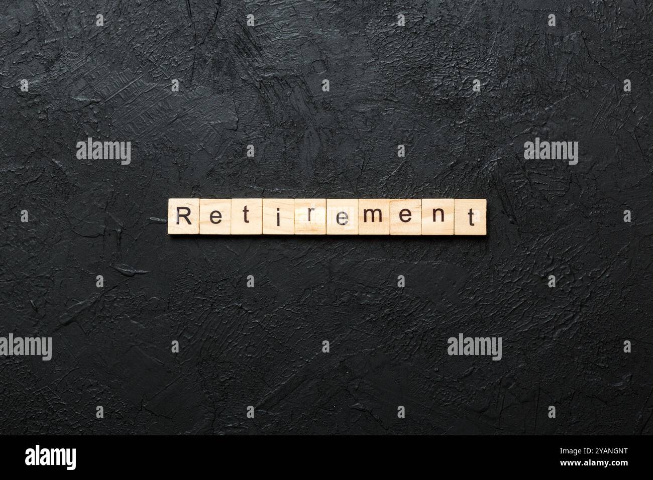 retirement word written on wood block. retirement text on cement table ...