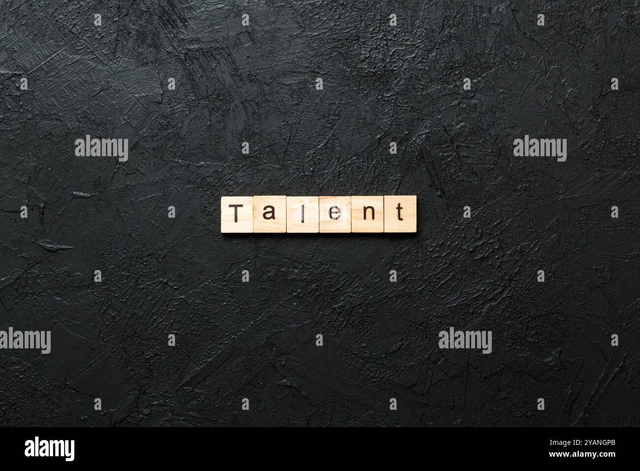 Talent word written on wood block. Talent text on cement table for your ...