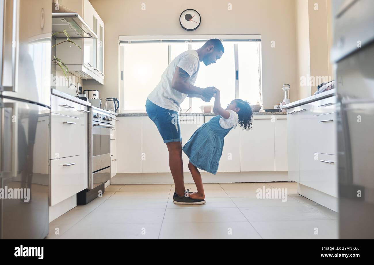 Dad, daughter and dancing in home, holding hands and support with ...