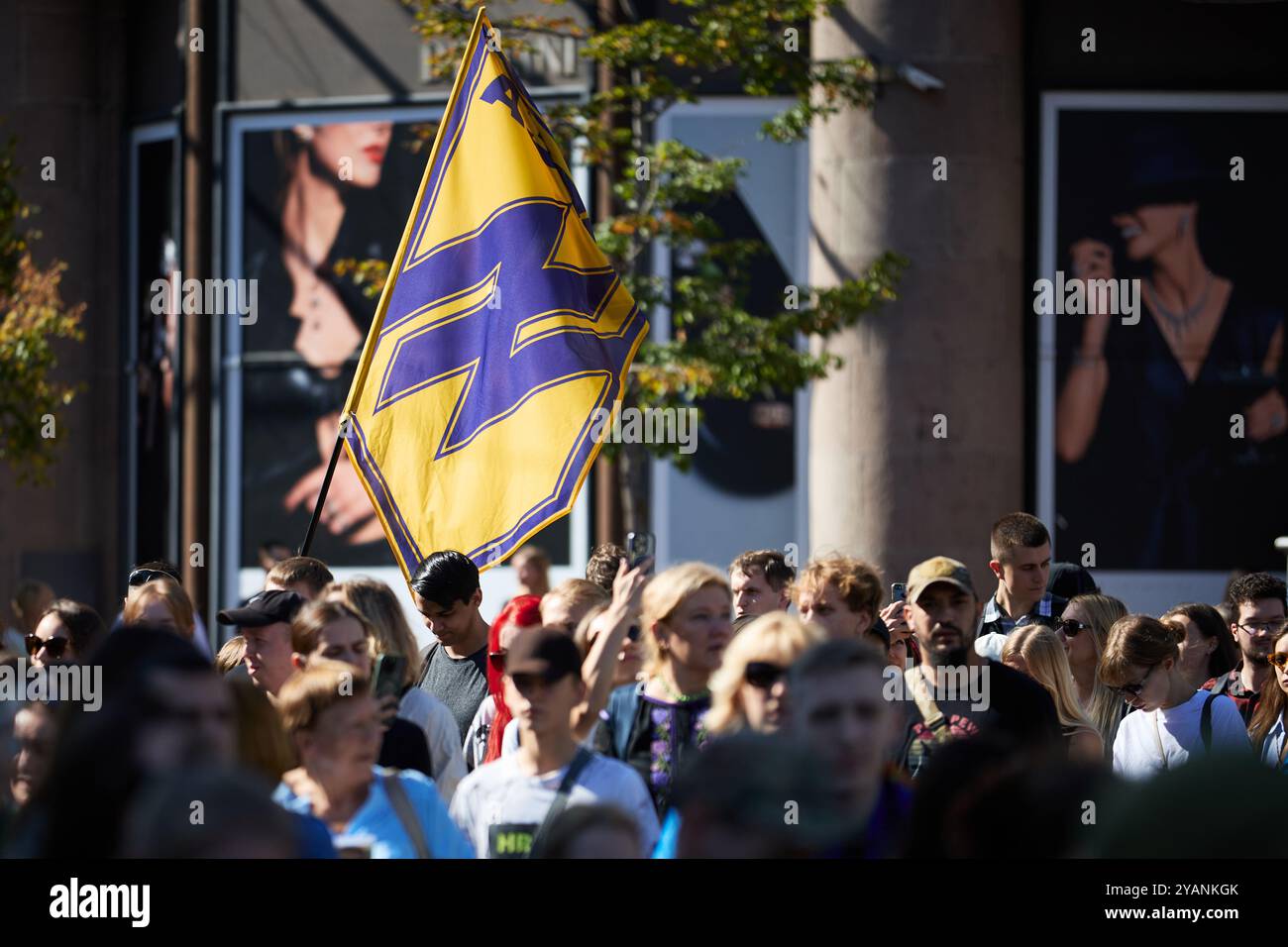 Flag of Azov brigade on a public demonstration. Ukrainian nationalists ...