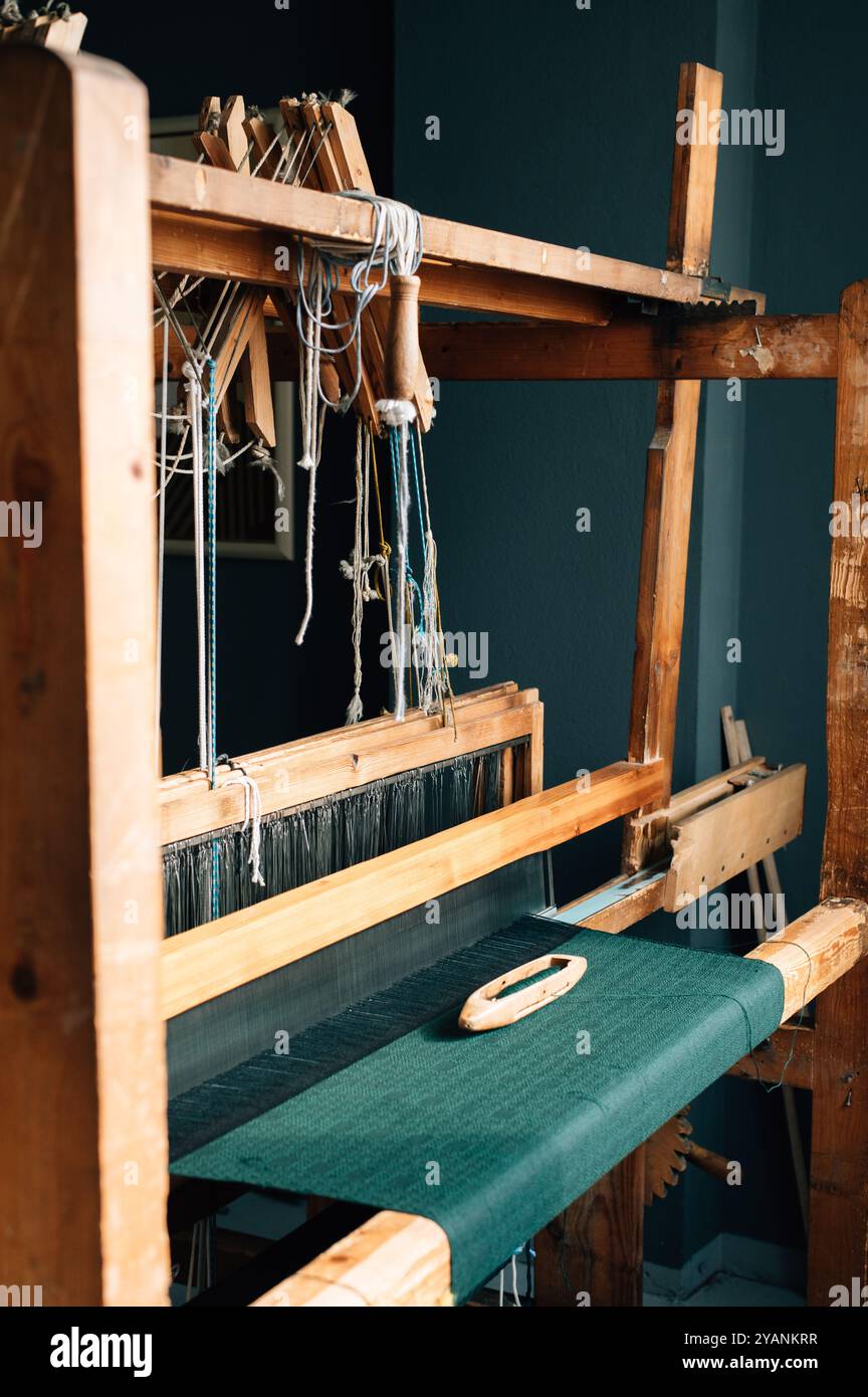 Weaving shuttle on the warp Stock Photo - Alamy